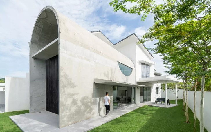 Arched Concrete Home Extension was Designed For Drama - GCO Portal